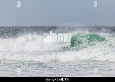 Turquoise blue wave in the Iroise Sea. Camaret, Crozon, Brittany ...