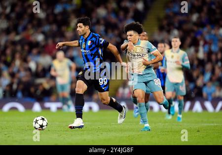 Inter Milan's Mehdi Taremi, right, makes an attempt to score during an ...