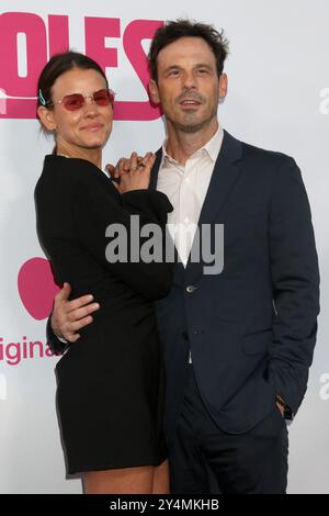 Sosie Bacon, left, and Scoot McNairy arrive at the Oscars on Sunday ...