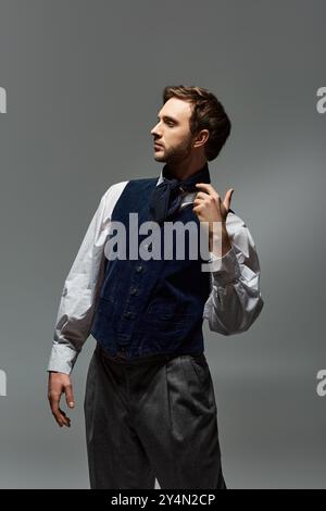 A handsome dandy showcases his unique style, striking a thoughtful pose ...