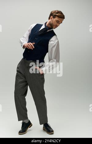 This handsome gentleman showcases his dandy style with an elegant pose ...
