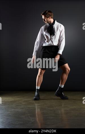 A handsome dandy showcases his unique style, striking a thoughtful pose ...