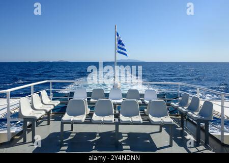 Deck of ferry with Greek flag. Aegean Sea, Cyclades, Greece Stock Photo ...