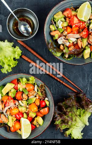 Avocado and crayfish mixed salad on a porcelain plate Stock Photo - Alamy