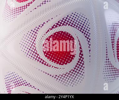 A closeup section of a modern generic moulded soccer football with a ...