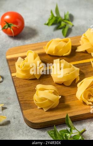 Raw Organic Italian Pappardella Fettuccine Pasta Ready to Cook Stock ...