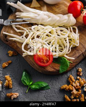 Traditional handmade Slovakian korbacik string Cheese Stock Photo - Alamy