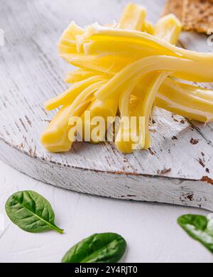 Traditional handmade Slovakian korbacik string Cheese Stock Photo - Alamy