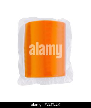 Block of cheddar cheese wrapped in plastic staying fresh and ready to ...