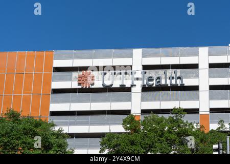 The UTHealth Houston logo and sign on the building of University of ...