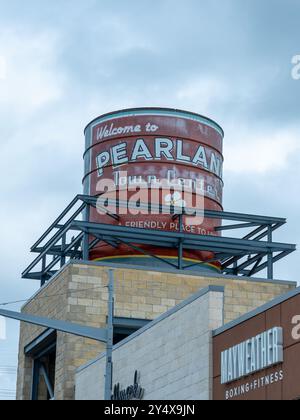 Welcome to Pearland Town Center sign on a tank above the roof in ...