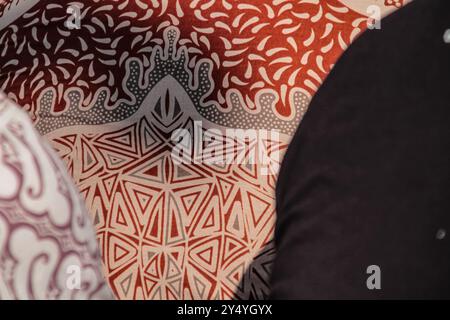 fabric background texture with detailed batik motifs Stock Photo - Alamy