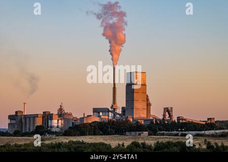 Dunbar cement works industrial structures with water vapour coming out ...