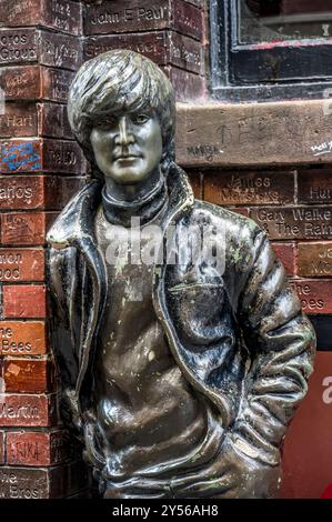 Statue of musician song writer John Lennon at the entrance to Liverpool ...