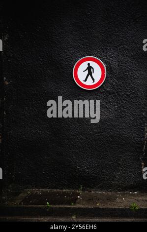 A Do not enter sign at the entrance to a tunnel. People Walk Forbidden ...