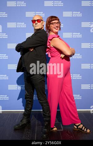 Scottish authors Grant Morrison and Jane Flett play up for the camera ...