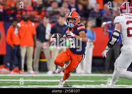 Syracuse wide receiver Trebor Pena (2) celebrates with running back ...