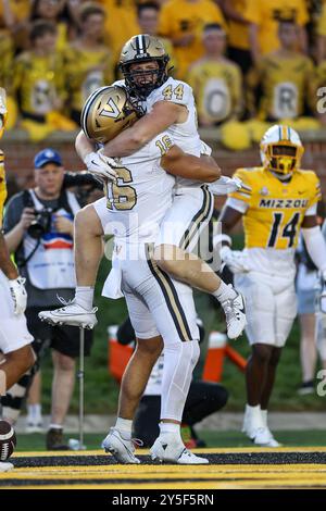Vanderbilt tight end Cole Spence (16) leaps over LSU linebacker Harold ...