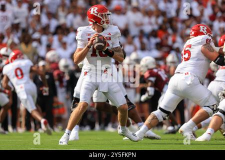 Rutgers quarterback Athan Kaliakmanis (16) hands the ball off to ...