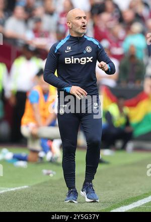 Chelsea's head coach Enzo Maresca sits on a bench ahead of the ...
