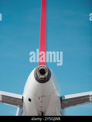 Tail fin tailplane / tail plane with white cross on red background of a ...