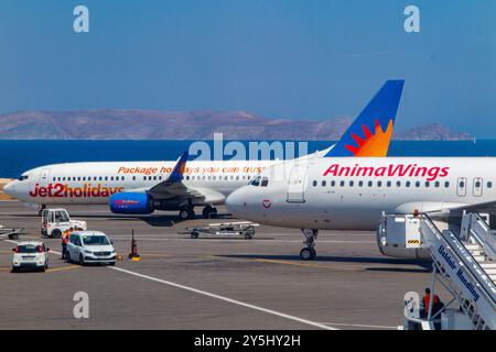 An Animawings and a Jet2 plane on the runway at Heraklion airport in ...