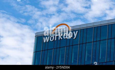 Workday logo and sign on the facade of software corporation ...