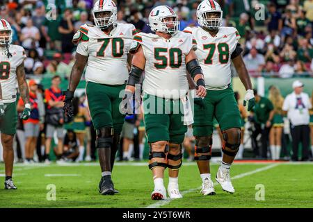 Miami offensive lineman Markel Bell (70) smiles after an NCAA football ...