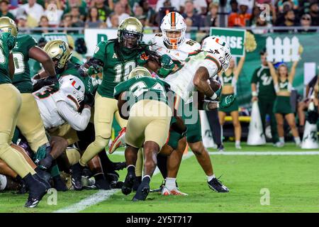 Miami running back Damien Martinez runs in the 40-yard dash at the NFL ...