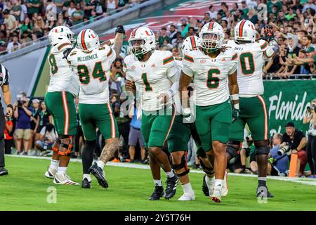 Miami offensive lineman Markel Bell (70) smiles after an NCAA football ...
