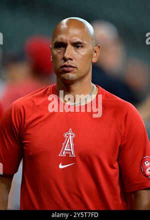 Los Angeles Angels infield coach Ryan Goins works with players during ...