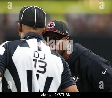 Atlanta Falcons head coach Raheem Morris talks to his assistants during ...