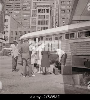 America of the 1940s. Vintage photo of boarding interstate buses at the ...