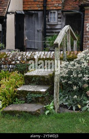 The Stone Steps and Wooden Handrail of a Garden Path Stock Photo - Alamy