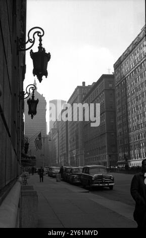 Pedestrians and traffic move along New York City streets C. 1952 Stock ...