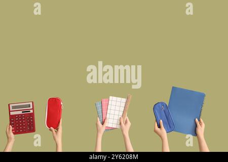 Female hands with set of school equipment on lilac background Stock ...