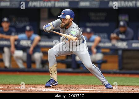 Toronto Blue Jays' Nathan Lukes celebrates in the dugout after scoring ...
