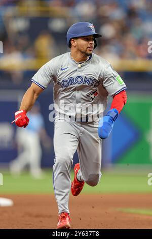Toronto Blue Jays' Jonatan Clase (8) hits a single against the ...