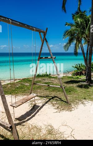 wooden swing on the sea beach at Koh MunNork Island, Rayong, Thailand ...