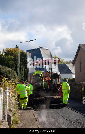 Workmen repairing road surface, Rhu, Scotland showing tar layer, Rhu ...