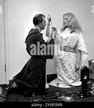 Pictured in London today is this occult duo, the King and Queen of ...