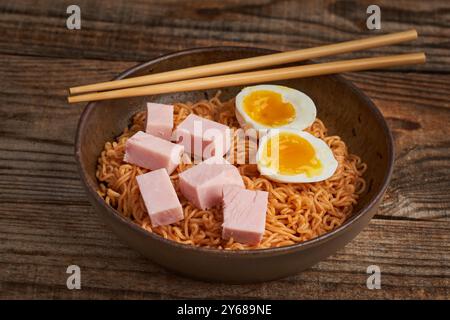 Bibimen, a Korean ramen noodles speciality, with pork and soft boiled ...
