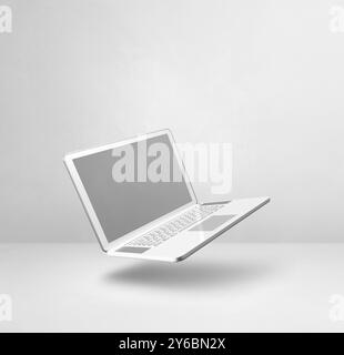 Blank computer laptop floating over a green background. 3D isolated ...