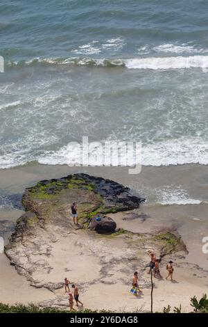 Praia da Cal (Cal Beach) shore with its rocks in Torres, Rio Grande do ...