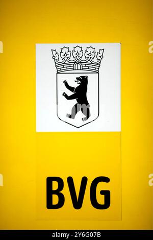 The coat of arms featuring a bear and BVG logo are displayed ...