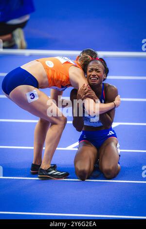 Cyréna Samba-Mayela celebrating with the flag of their country in the ...