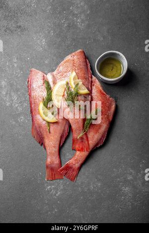 Fresh red sea bass on blue background. Top view, copy space Stock Photo ...