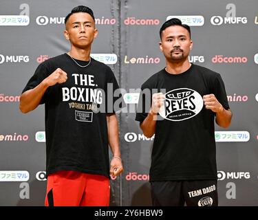 Daigo Higa , left, of Japan fight with Seiya Tsutsumi , right, of Japan ...