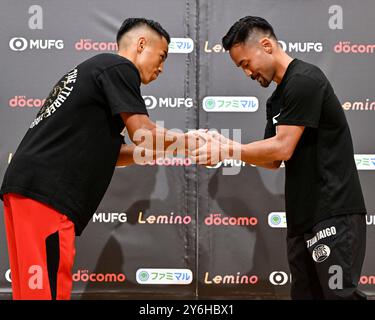 Daigo Higa , left, of Japan fight with Seiya Tsutsumi , right, of Japan ...
