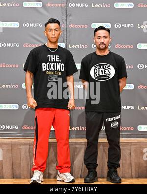 Daigo Higa , left, of Japan fight with Seiya Tsutsumi , right, of Japan ...